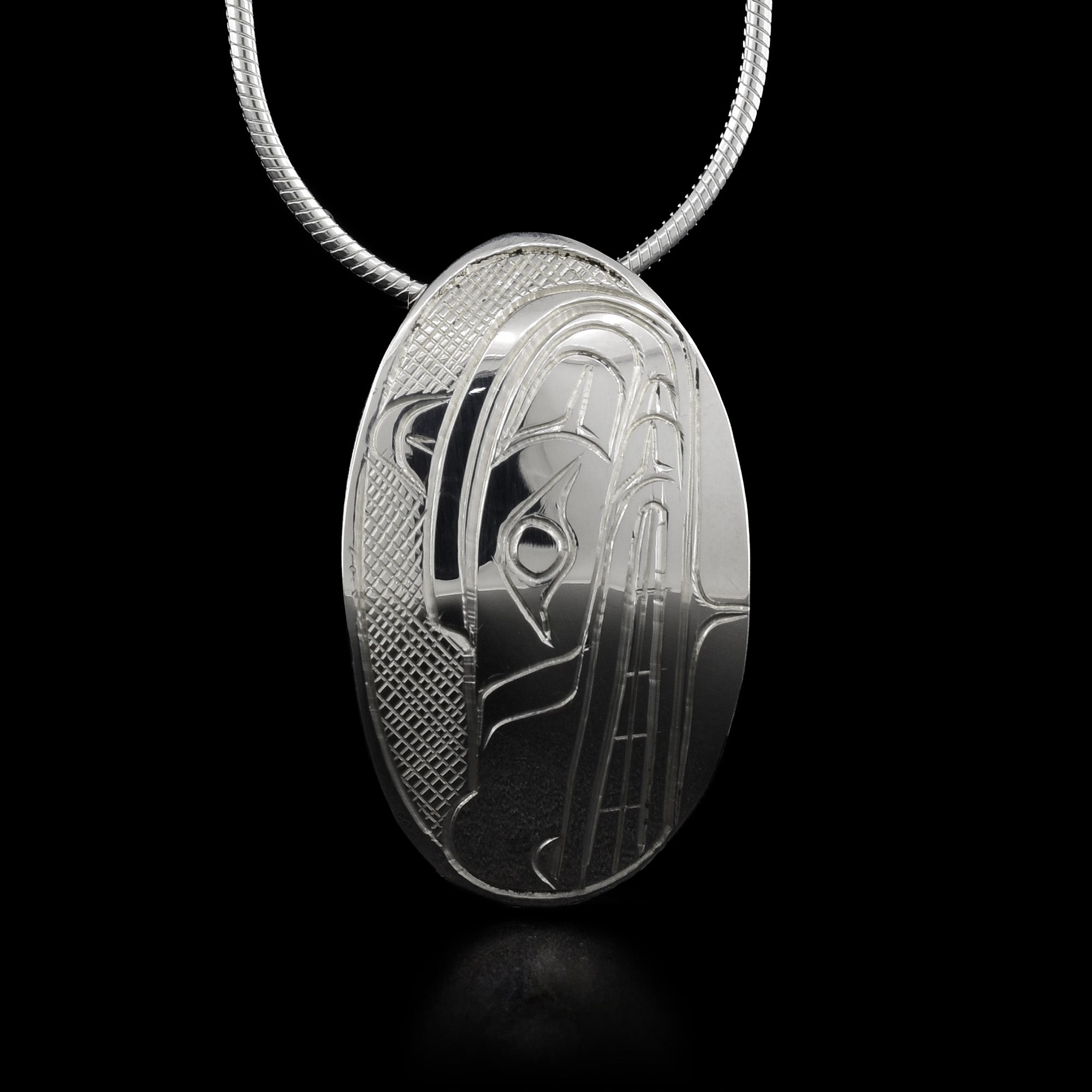 Sterling_Silver_Travis_Henry_Oval_Wolf_Pendant.jpg?v=1714345934